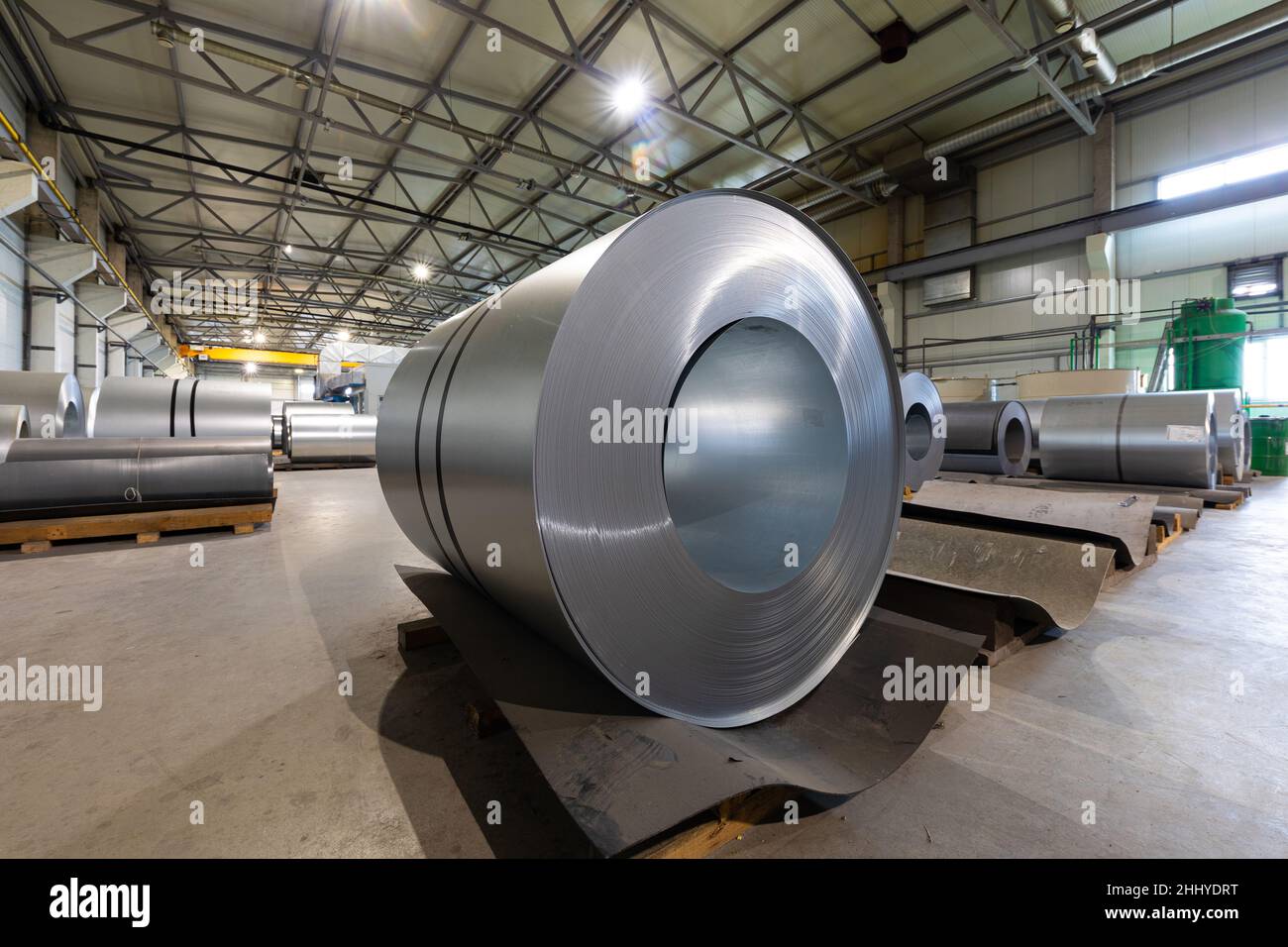 Closeup photo of metal tile for roof in metallic forming machine ...