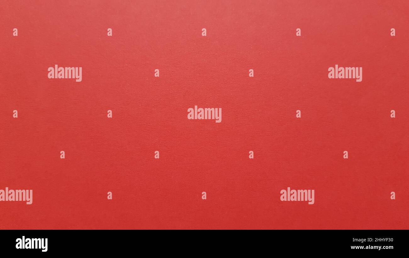 Close up red paper table for background Stock Photo - Alamy