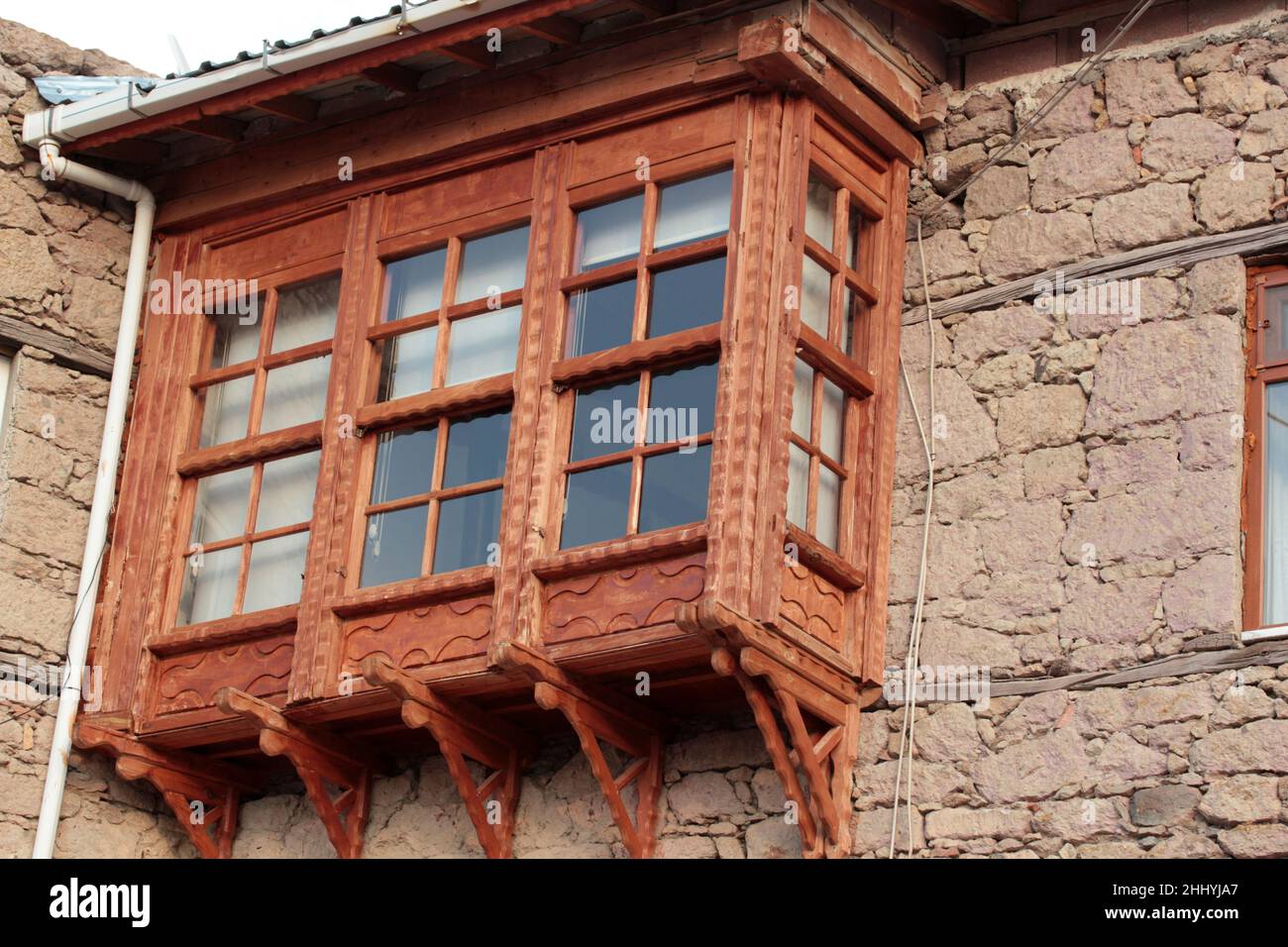 old stone house restored bay window Stock Photo - Alamy