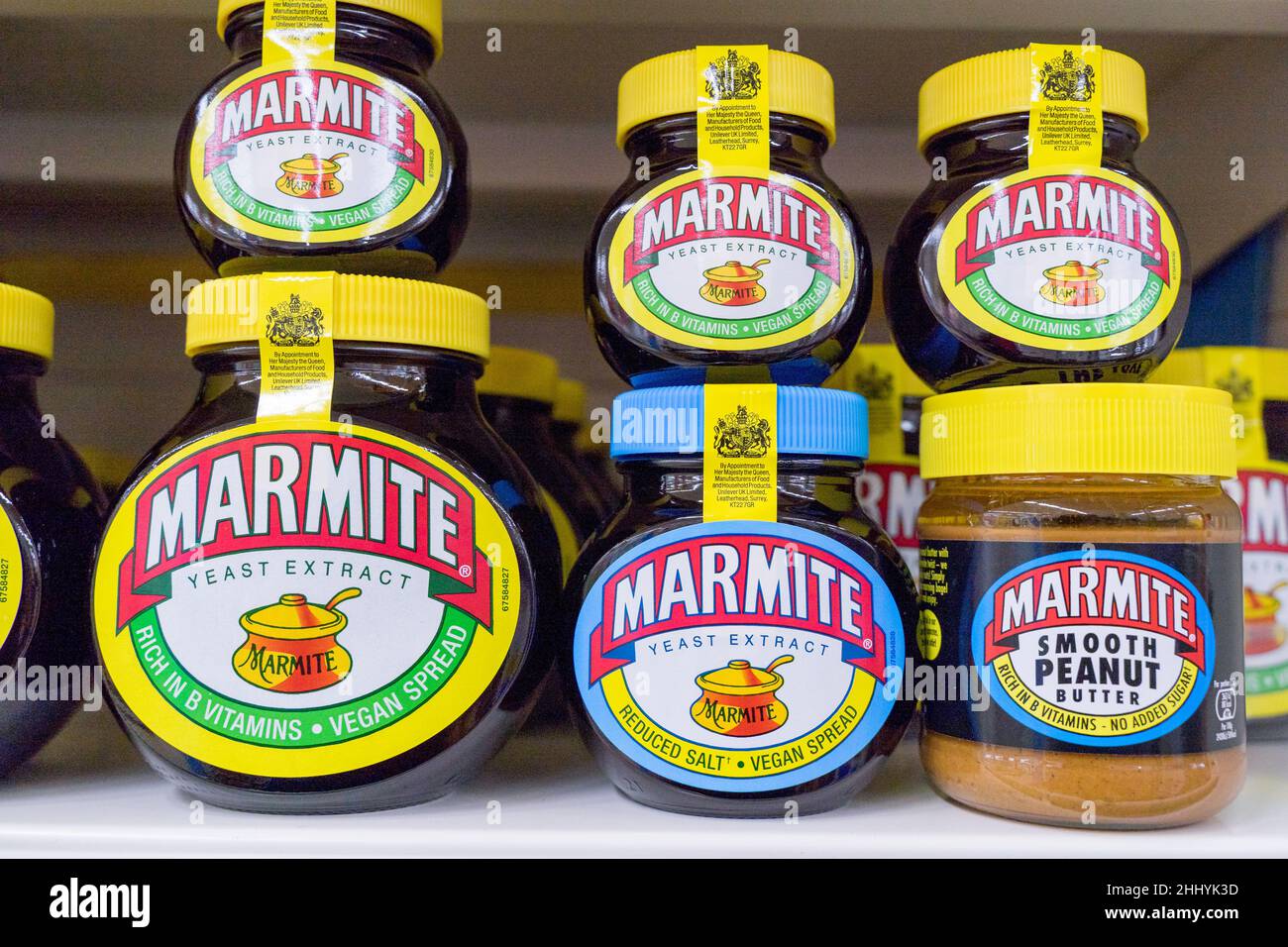 row of Marmite jam jars display on cabinet shelf Stock Photo - Alamy