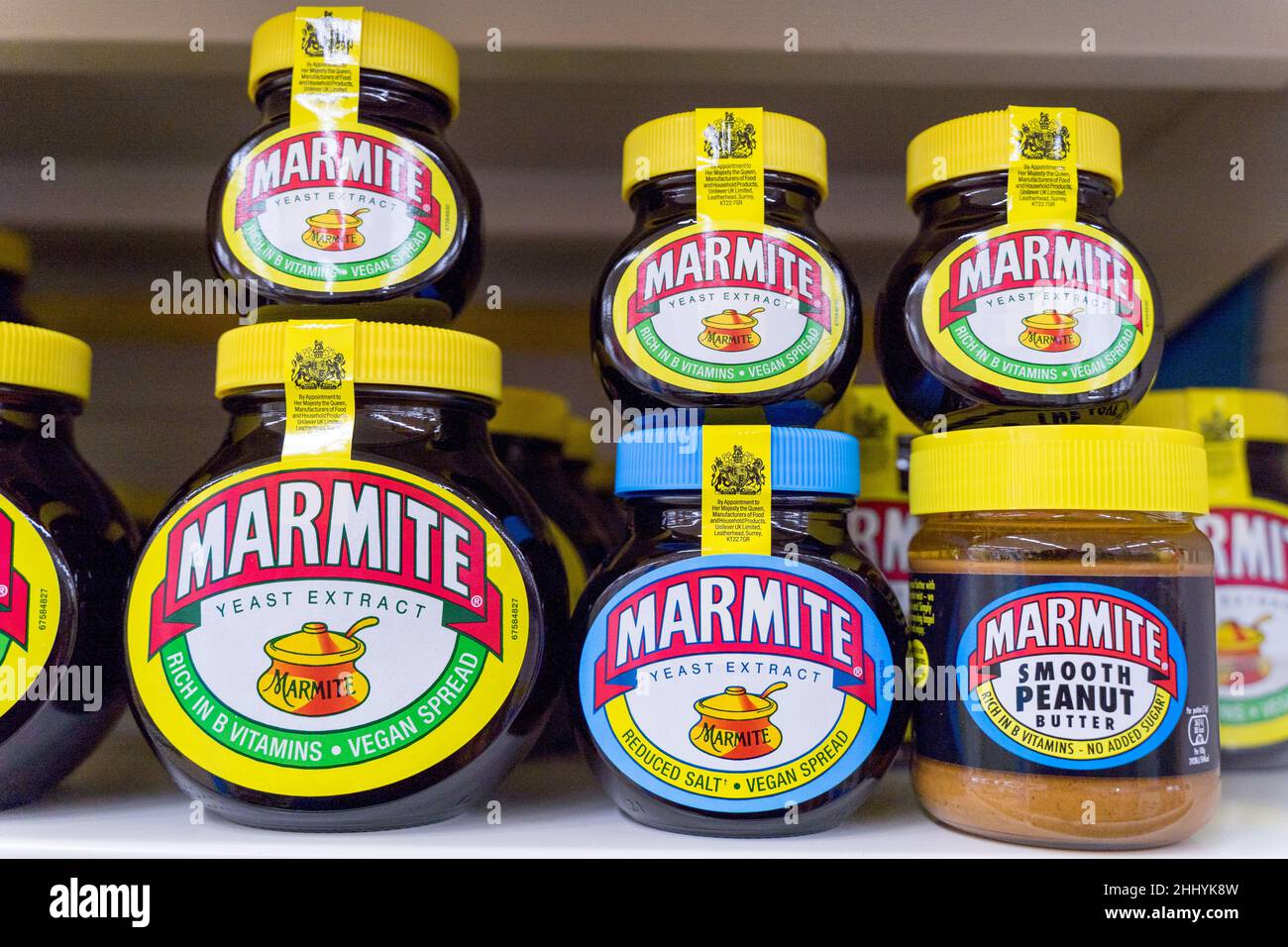 row of Marmite jam jars display on cabinet shelf Stock Photo - Alamy