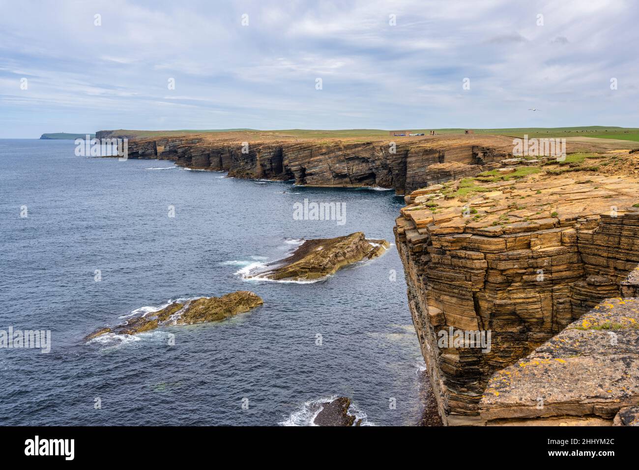 View looking north across the rugged sandstone cliffs of Yesnaby ...