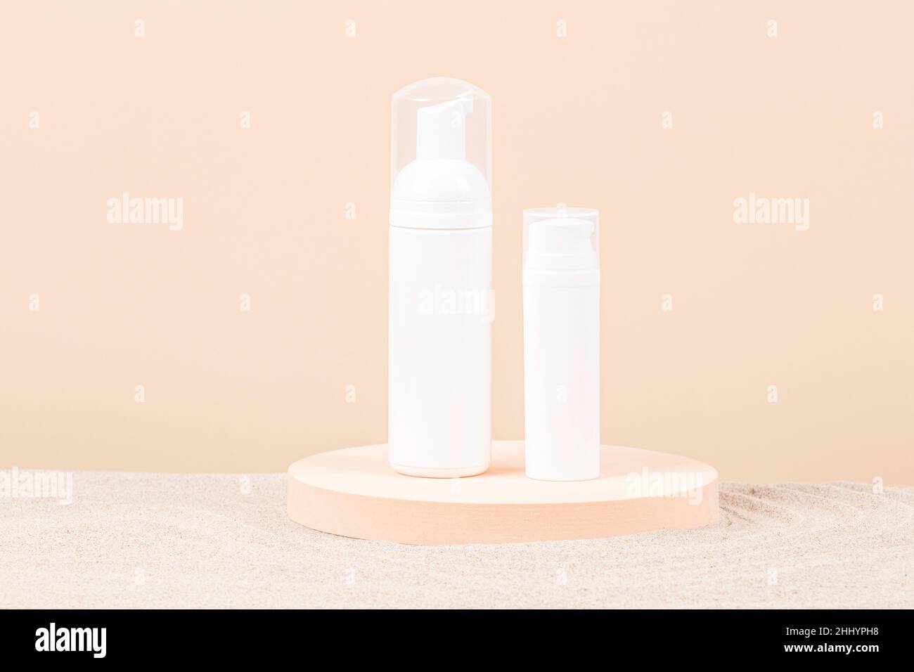 Two white blank plastic packaging cosmetic pump bottles for mousse foam ...