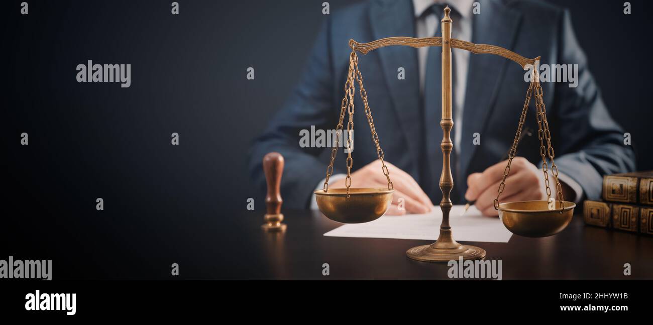 Lawyer working in the office. Law concept with weight scale Stock Photo ...