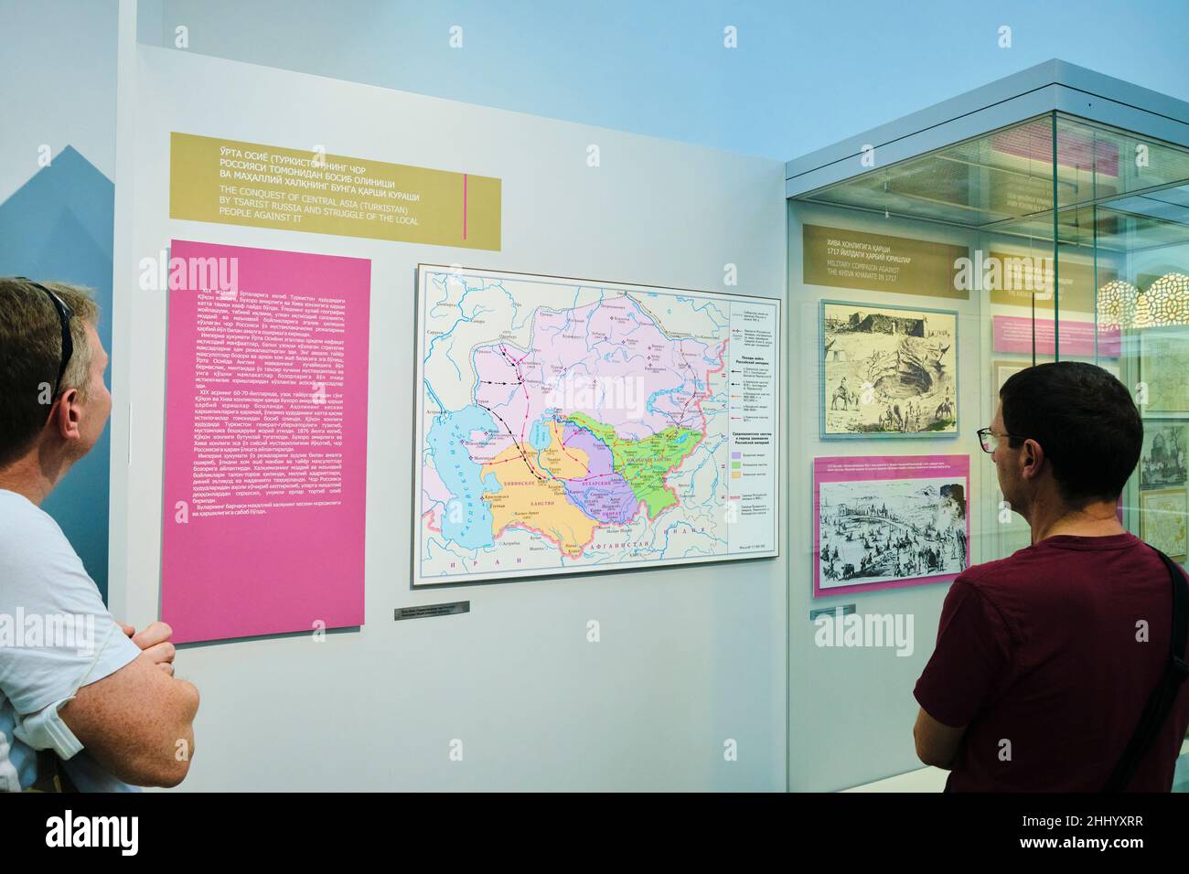 Visitors looking at a map that shows Tsarist Russia conquests in ...