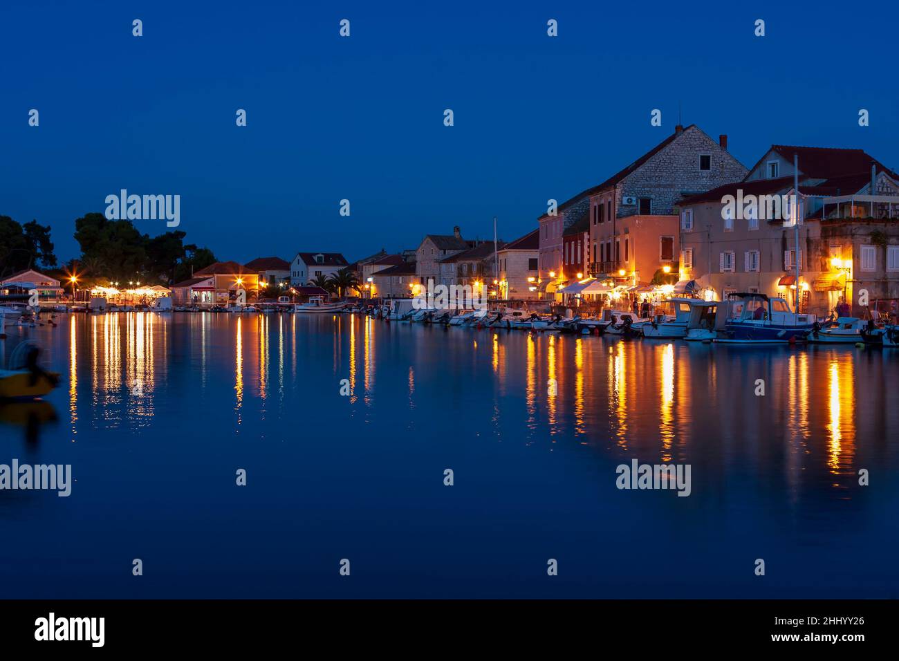 View of night city Stari Grad on Hvar island and as background is blue ...