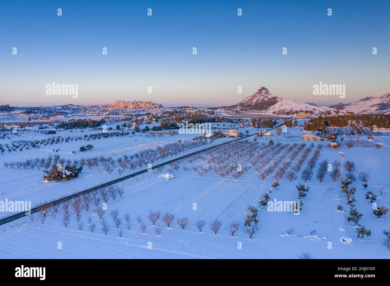 Horta de Sant Joan village aerial view in a winter snowy afternoon ...