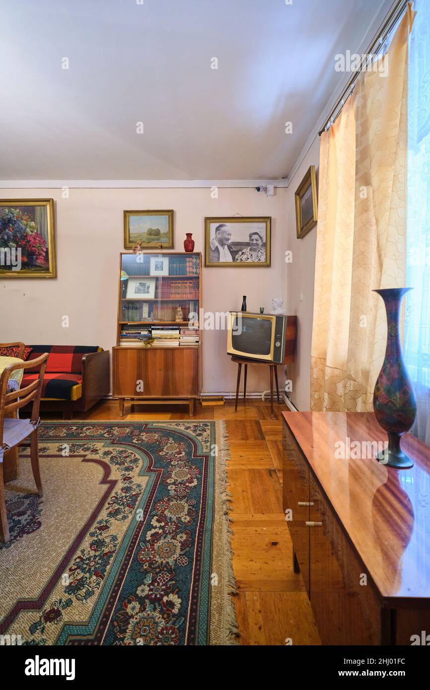 The dining room with table and TV, television. At the painter Ural ...