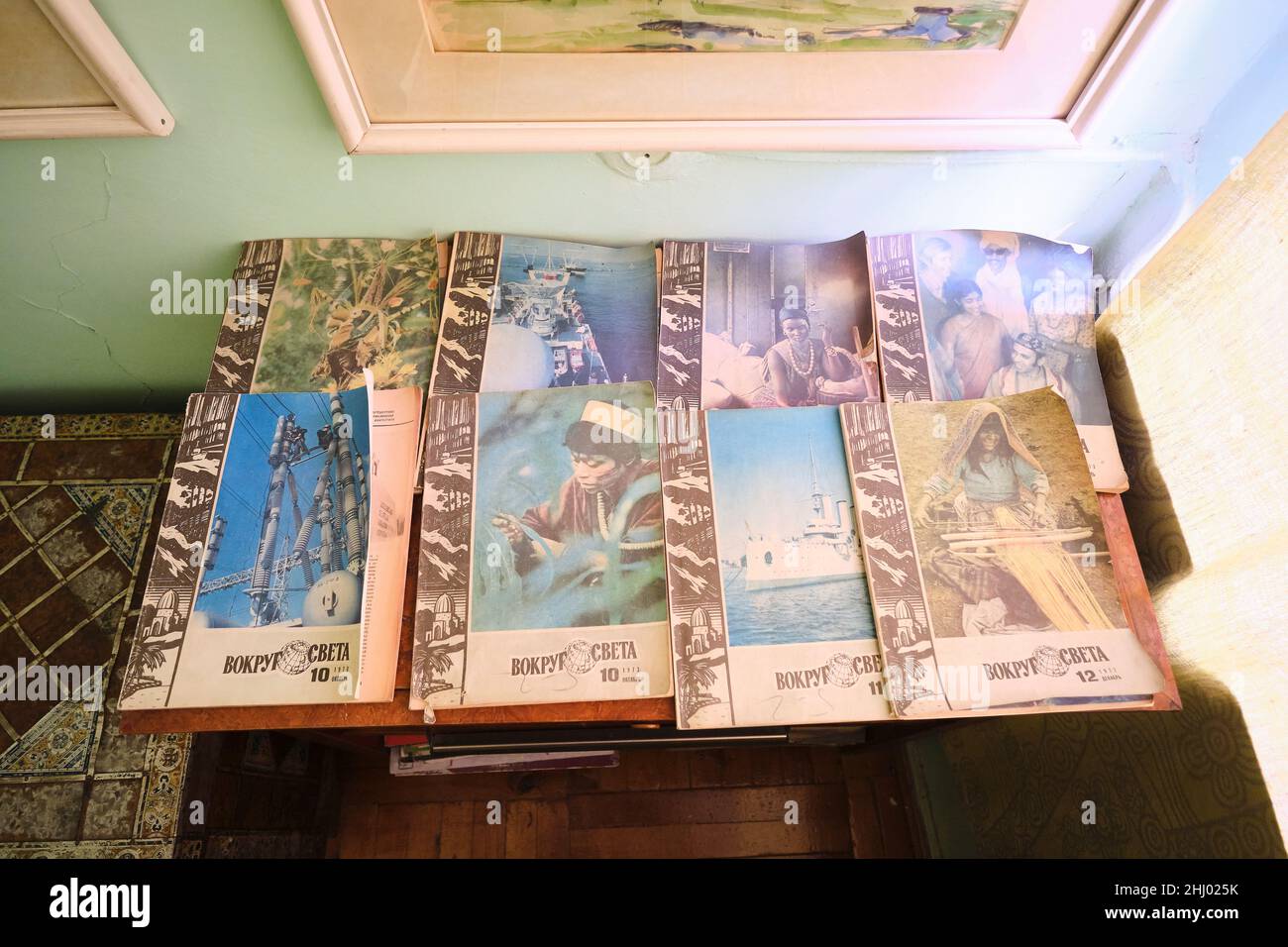 A small study with old copies of the Russian geographic magazine ...