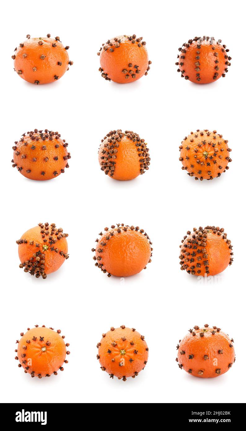 Set of orange pomander balls on white background Stock Photo - Alamy