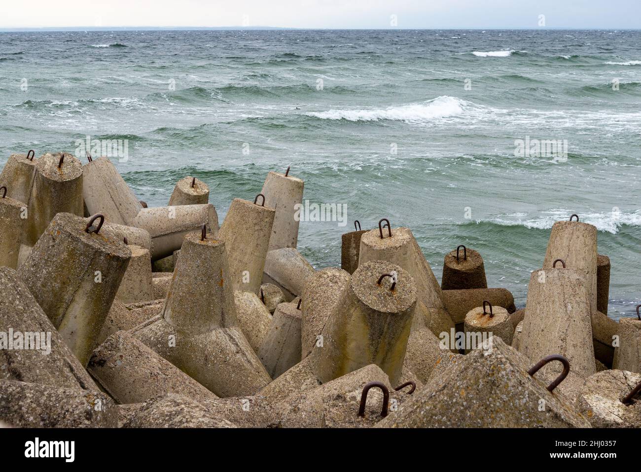 Concrete elements protecting the seashore, breakwater in Hel Peninsula ...