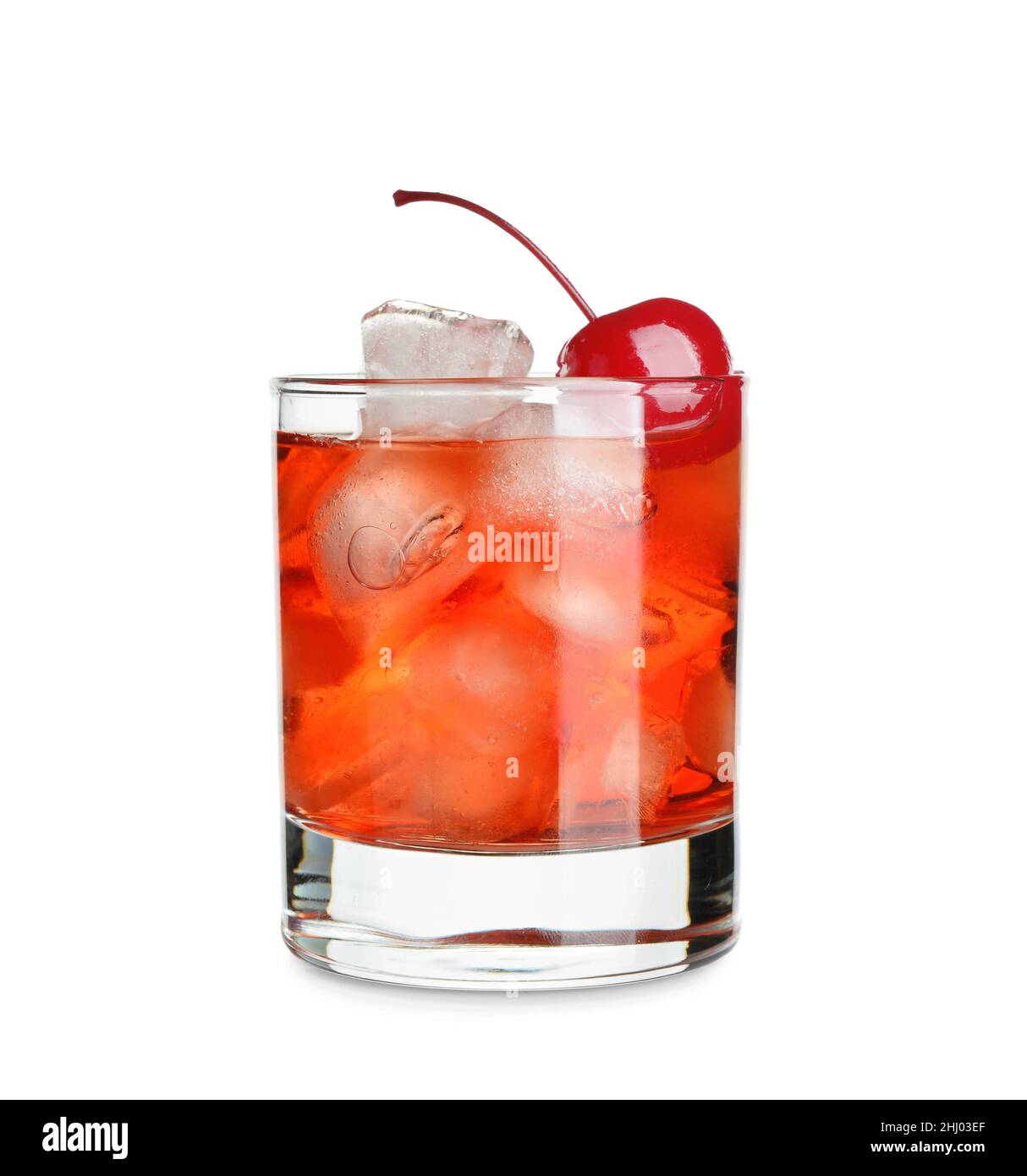 Glass of Manhattan cocktail with cherry and ice on white background ...
