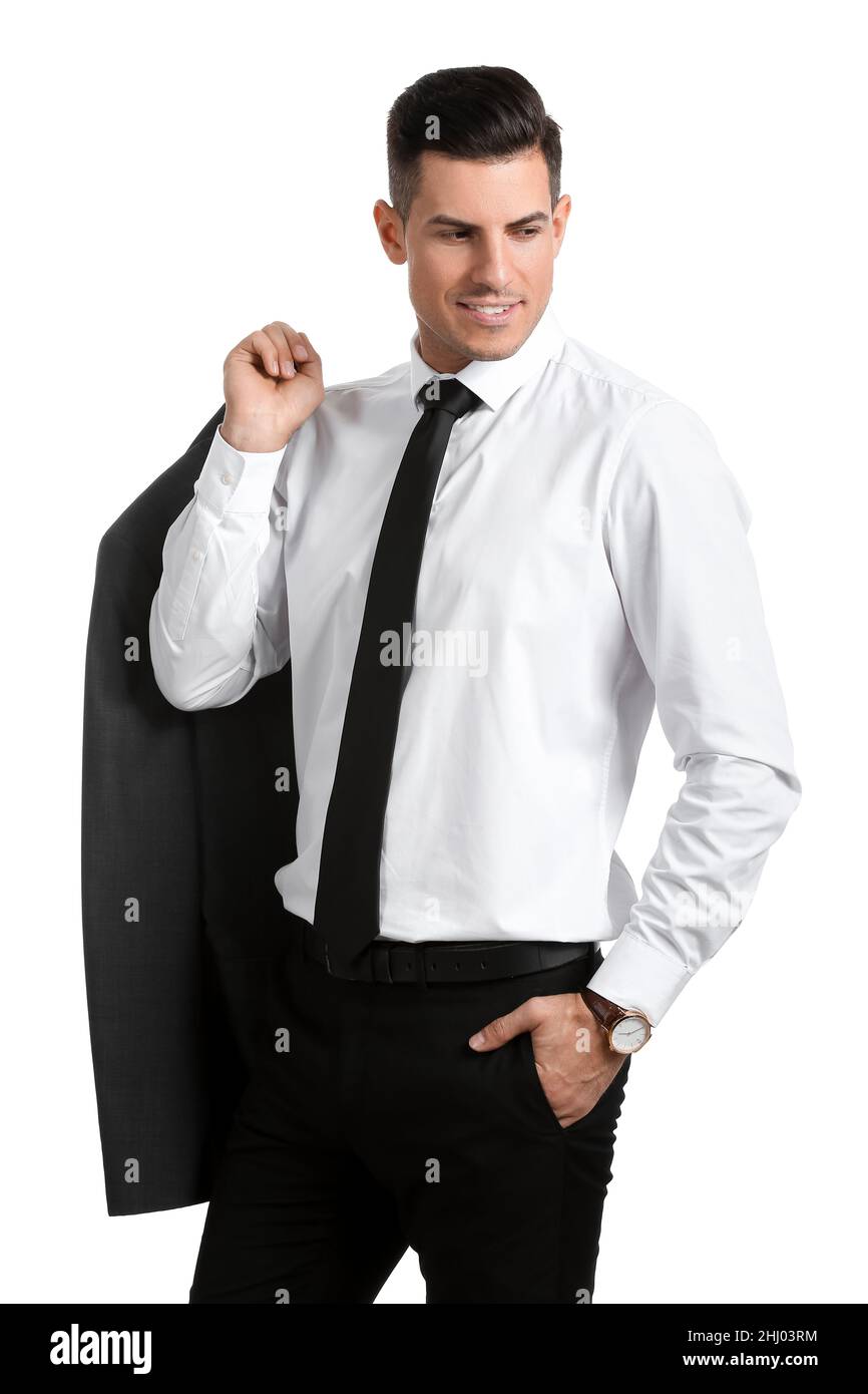 Young handsome man in formal suit holding jacket over shoulder on white ...