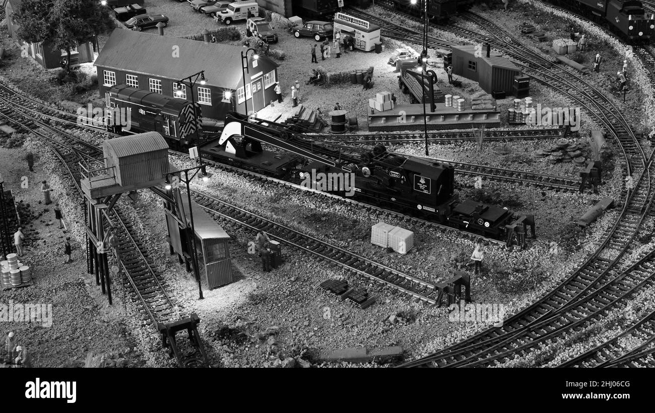 A service crane and class 08 locomotive on a model railway Stock Photo ...