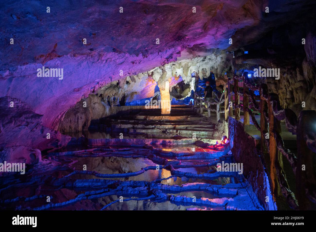 Underground karst cave illuminated by color light,Located in Guangdong ...
