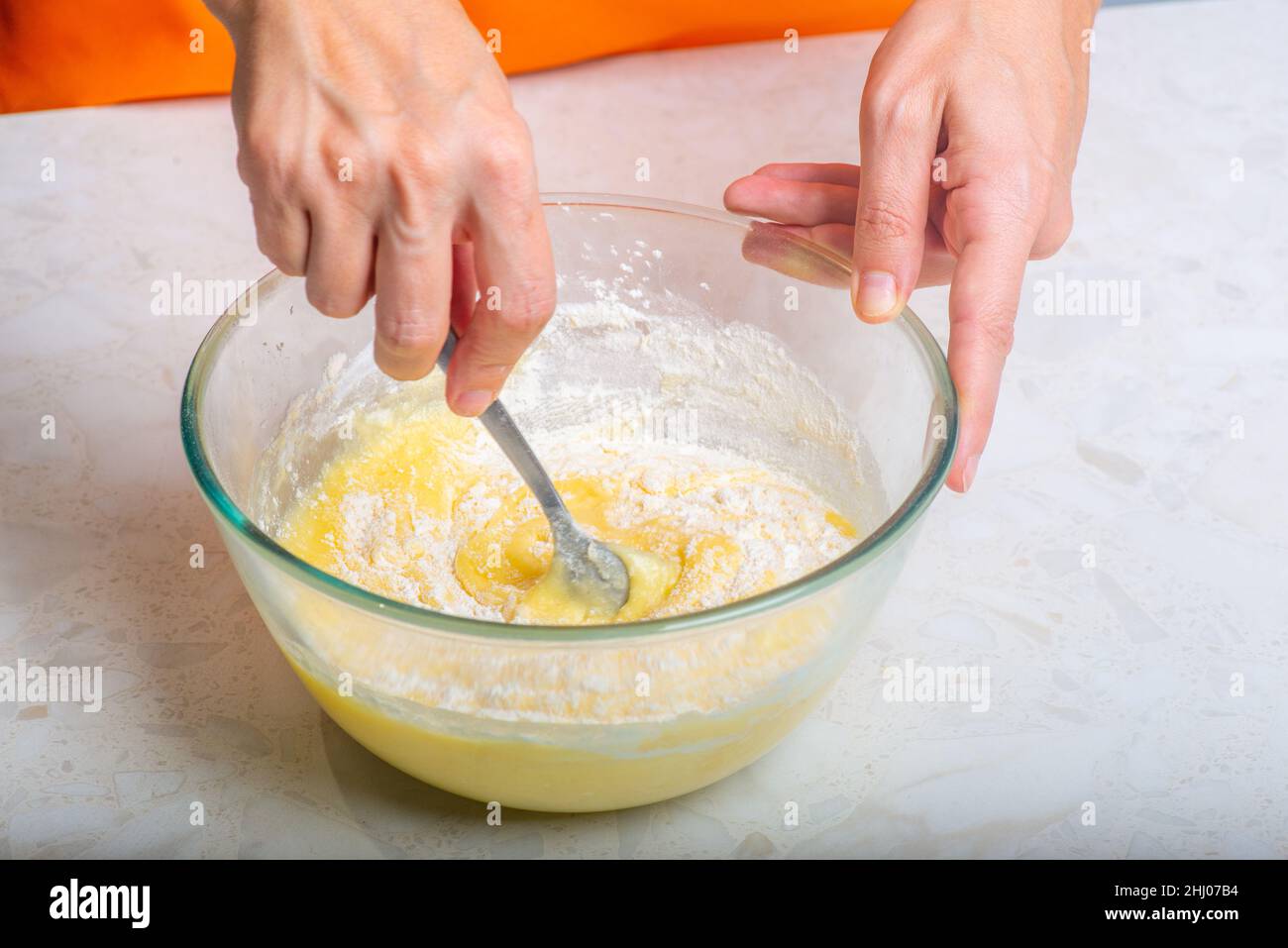 mix flour in a cup with ingredients Stock Photo - Alamy