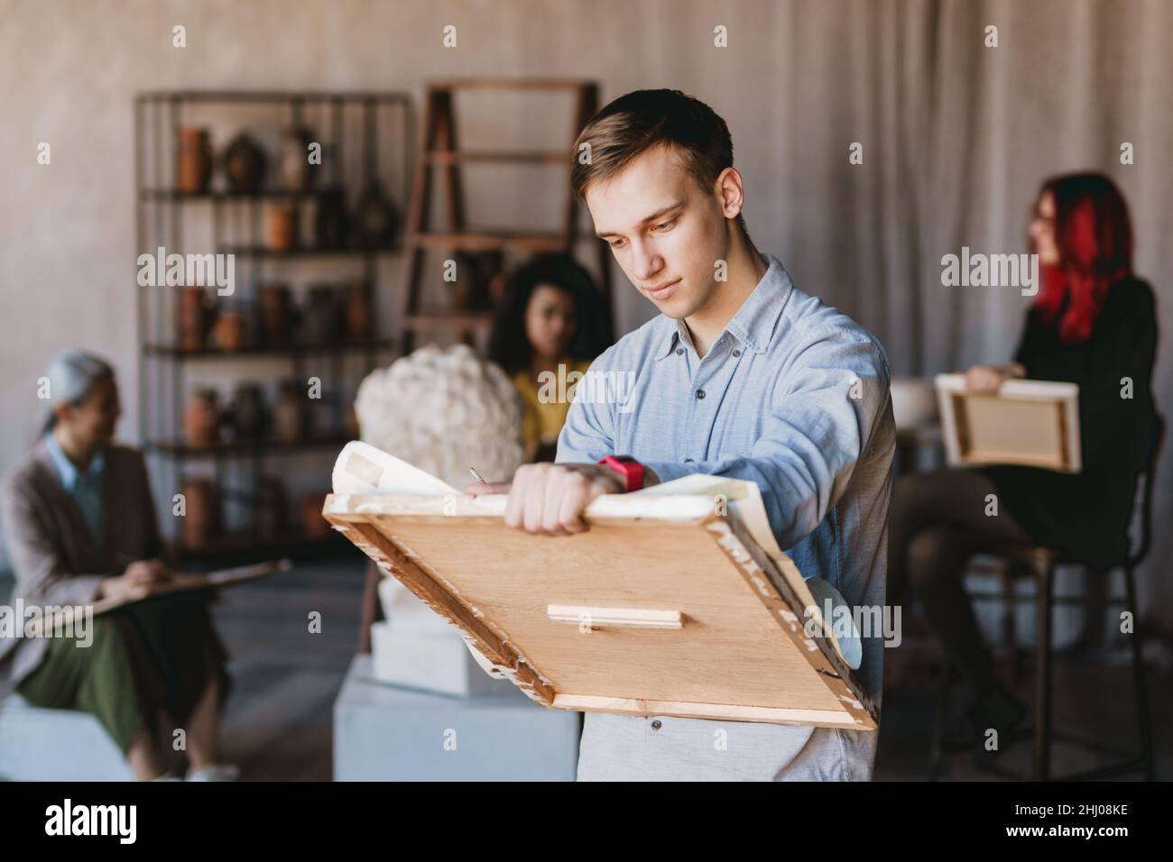 Multiracial college student drawing hi-res stock photography and images ...