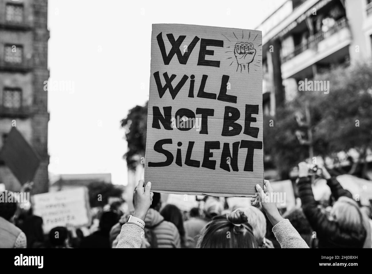People protest on the street for equal rights - Focus on hands holding ...