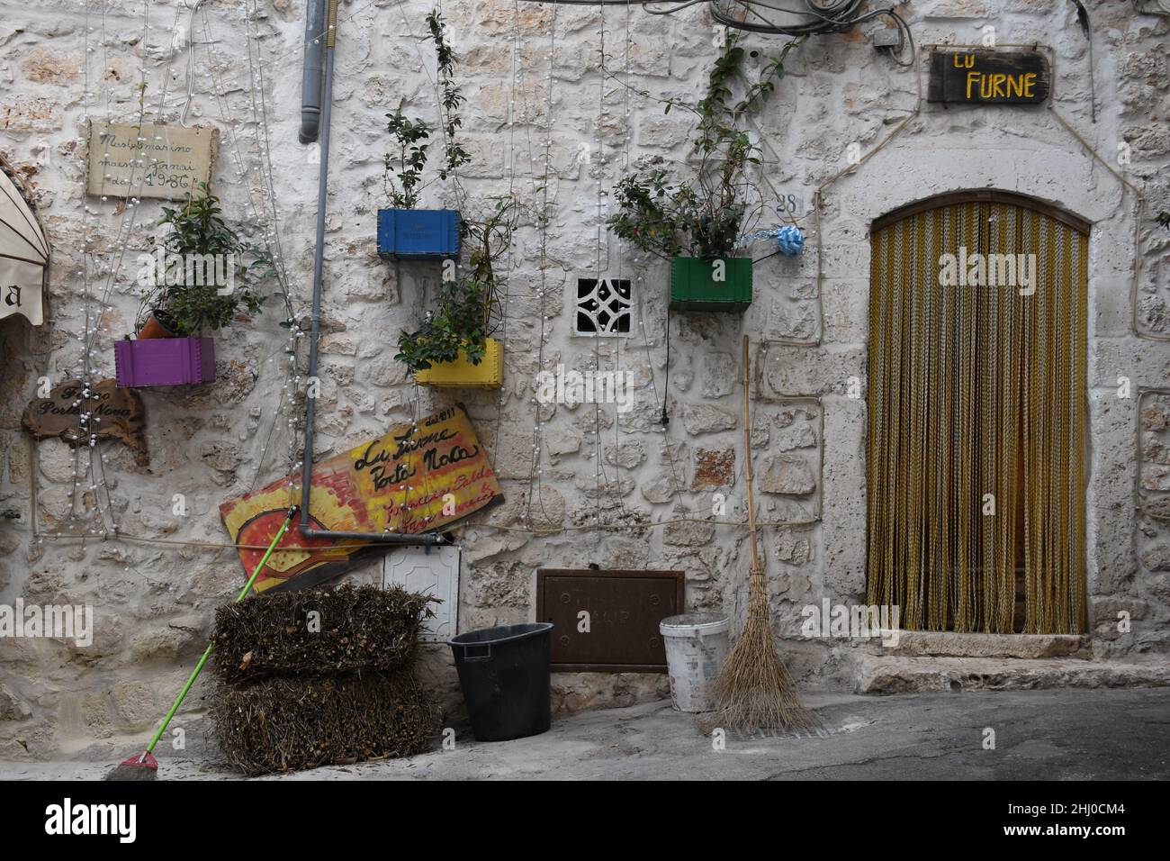 View of a shop entrance inside the old town of Ostuni, also known as ...