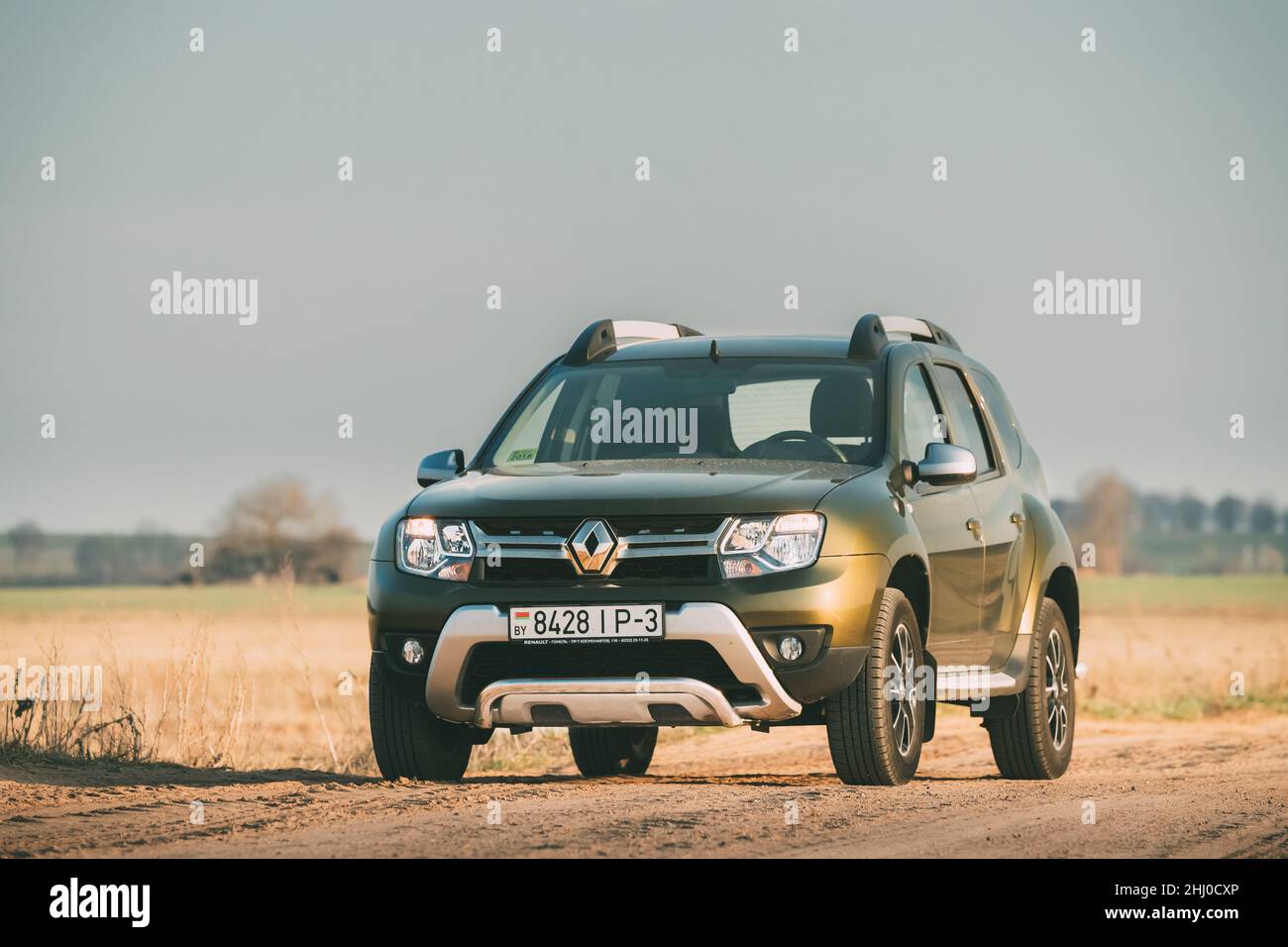 Car Renault Duster Or Dacia Duster Suv Parked On Field Country Road ...