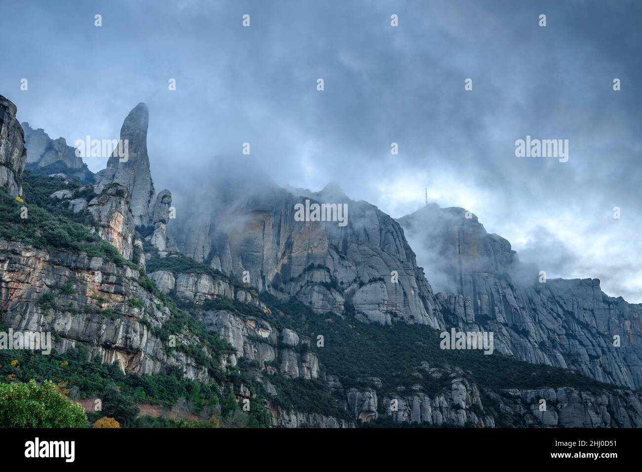 Needles on the of Montserrat north face on a stormy autumn cloudy ...