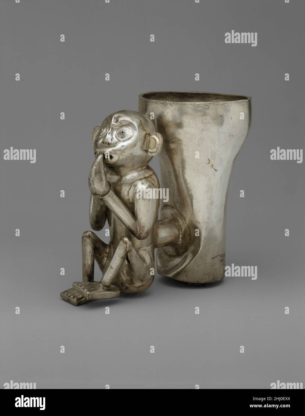 Monkey holding vessel hi-res stock photography and images - Alamy