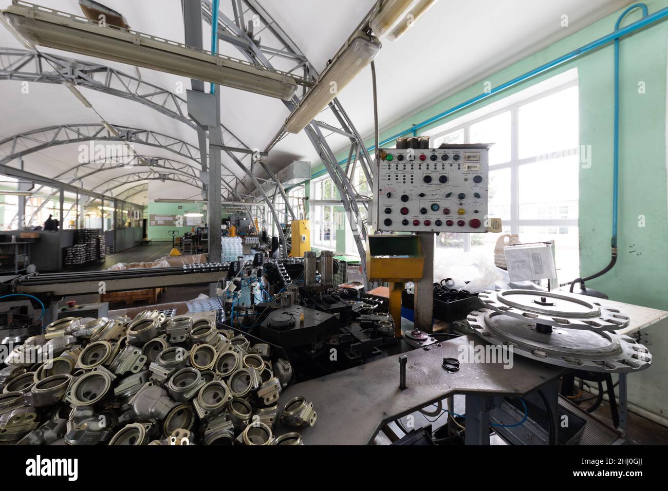 Photo of automobile assembly production. Factory with steel ...