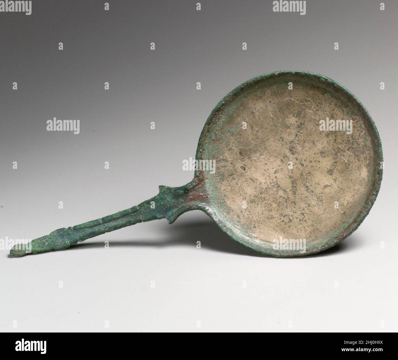 Mirror with Dioskouroi Etruscan The engraved design represents the two ...