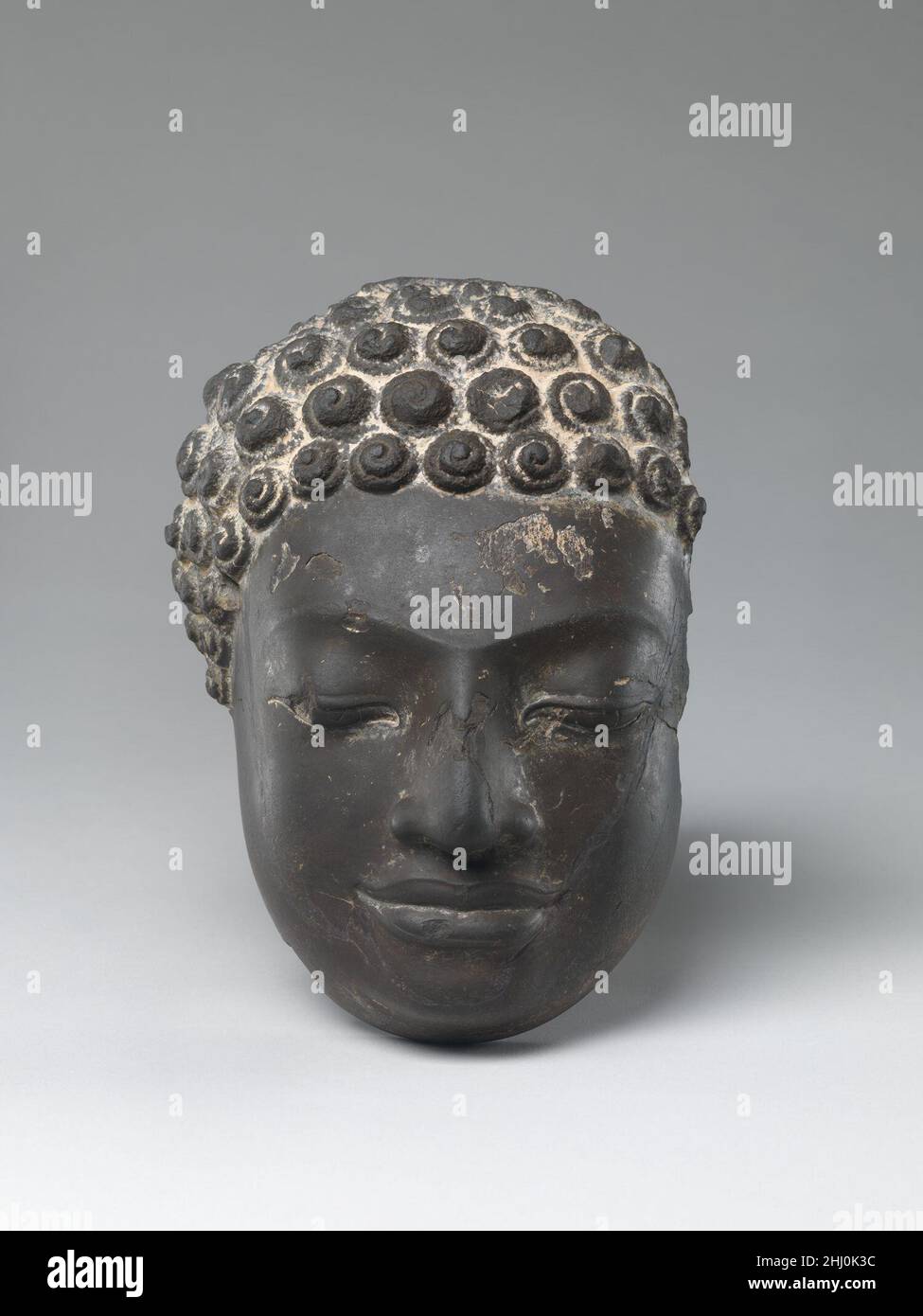 Head of a Buddha 8th century Thailand. Head of a Buddha. Thailand. 8th ...