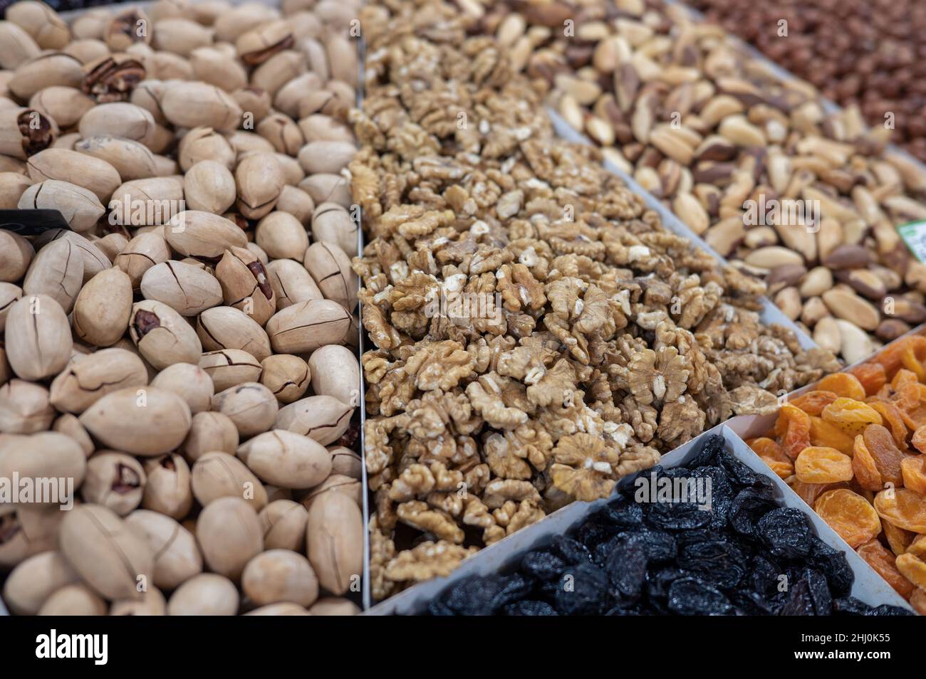 Dried fruits and nuts on local food market Stock Photo - Alamy