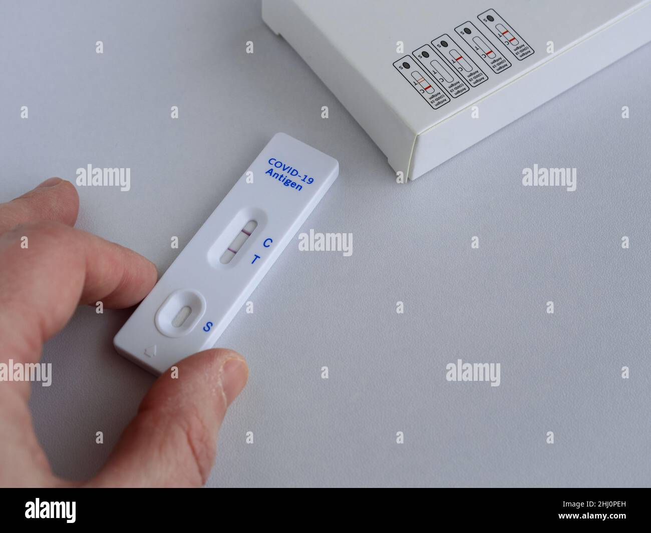 Covid-19 positive antigen test Stock Photo - Alamy