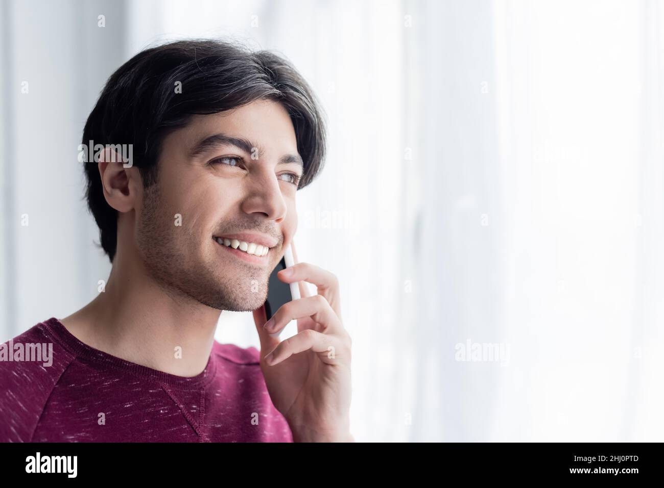 Smiling brunette young man hi-res stock photography and images - Alamy