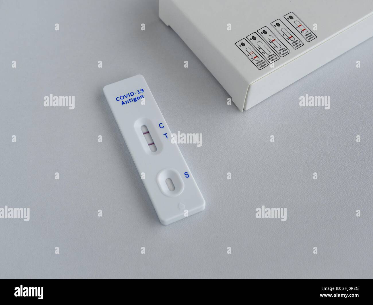 Covid-19 positive antigen test Stock Photo - Alamy
