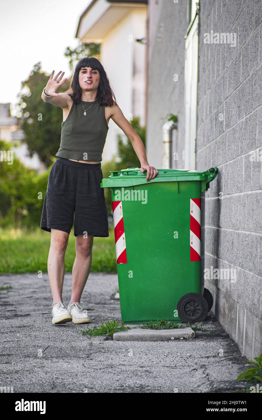 Girl with cartoon dustbin hi-res stock photography and images - Alamy