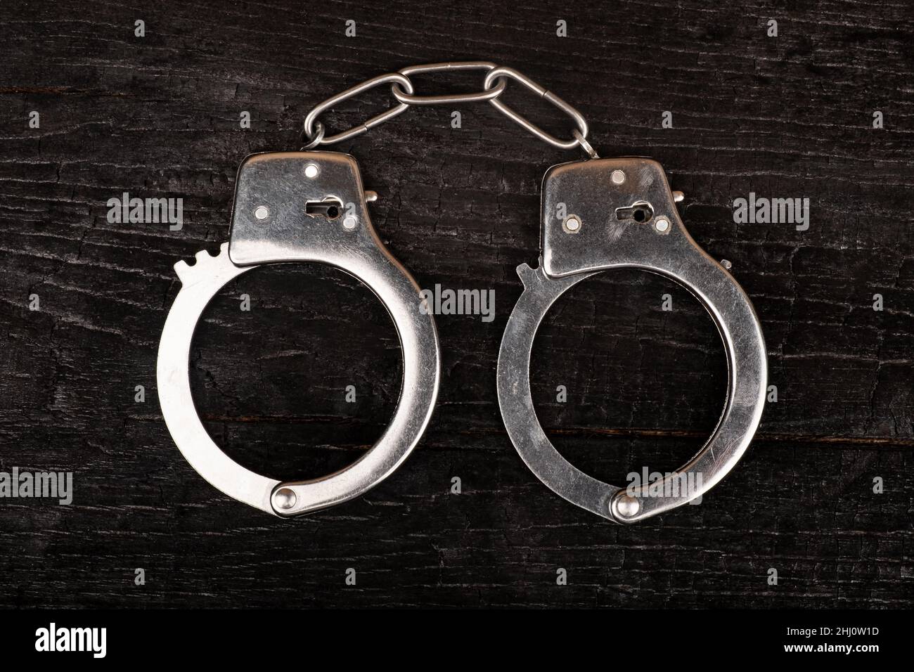 Handcuff chain hi-res stock photography and images - Alamy