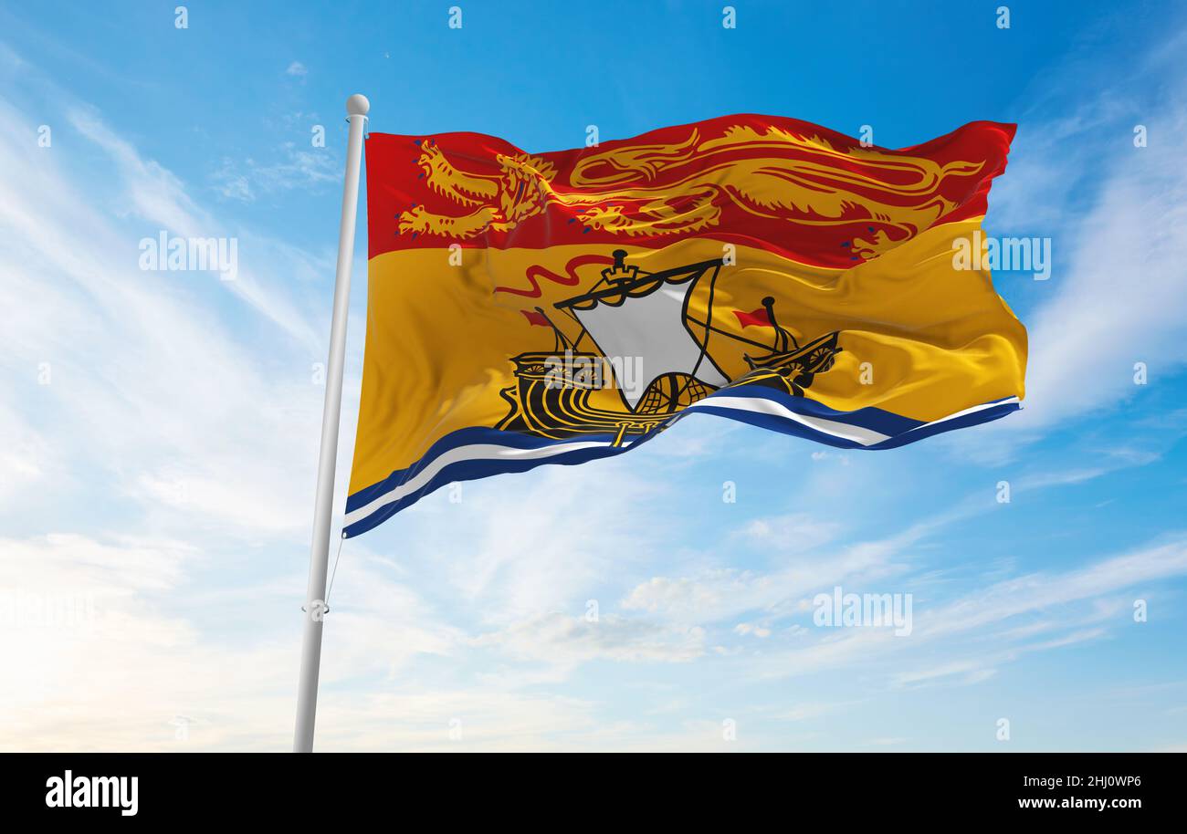 flag of New Brunswick , Canada at cloudy sky background on sunset ...