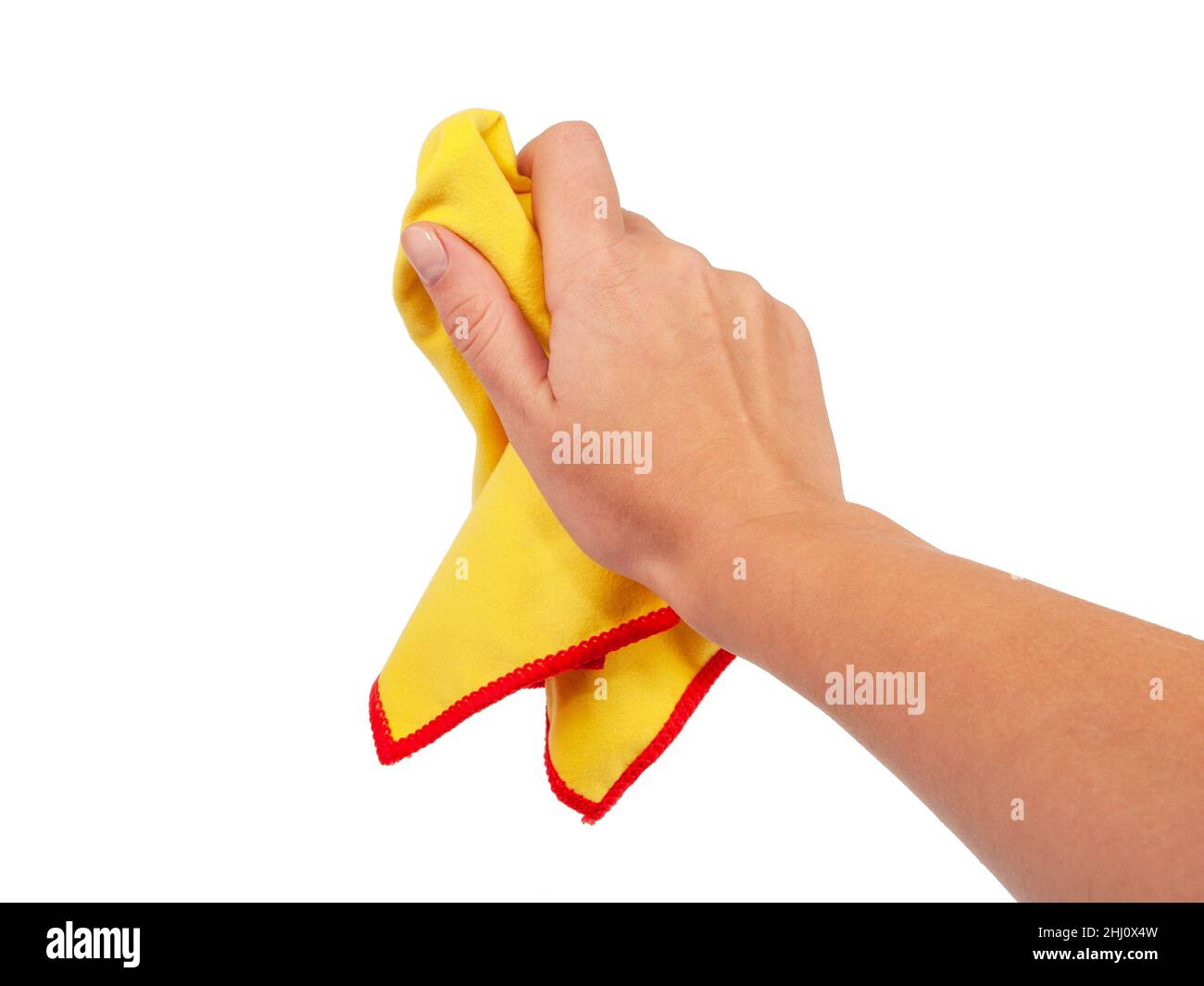 Yellow cleaning rag in hand isolated on the white Stock Photo - Alamy
