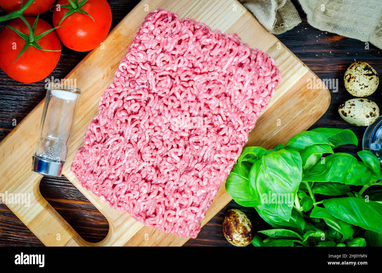 Fresh meat ground to the ground with other ingredients Stock Photo - Alamy