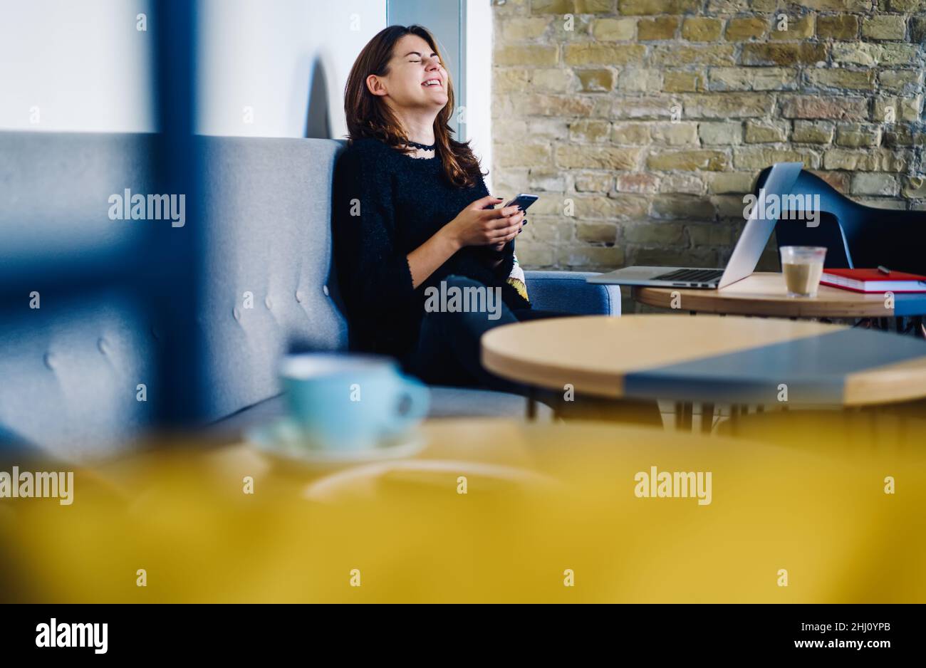 Excited laughing woman reading hi-res stock photography and images - Alamy