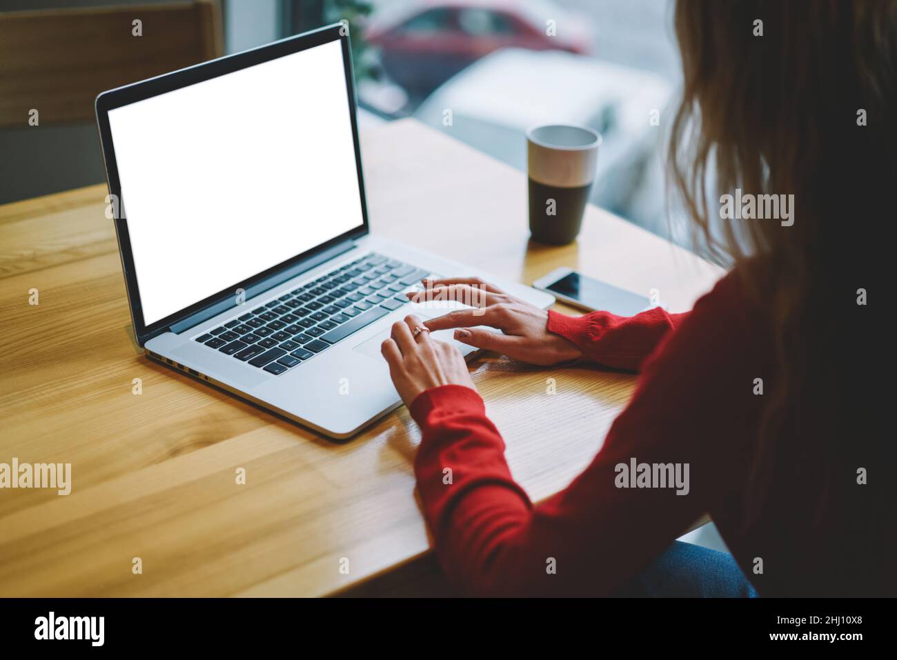 Anonymous female freelancer using computer in workplace Stock Photo - Alamy
