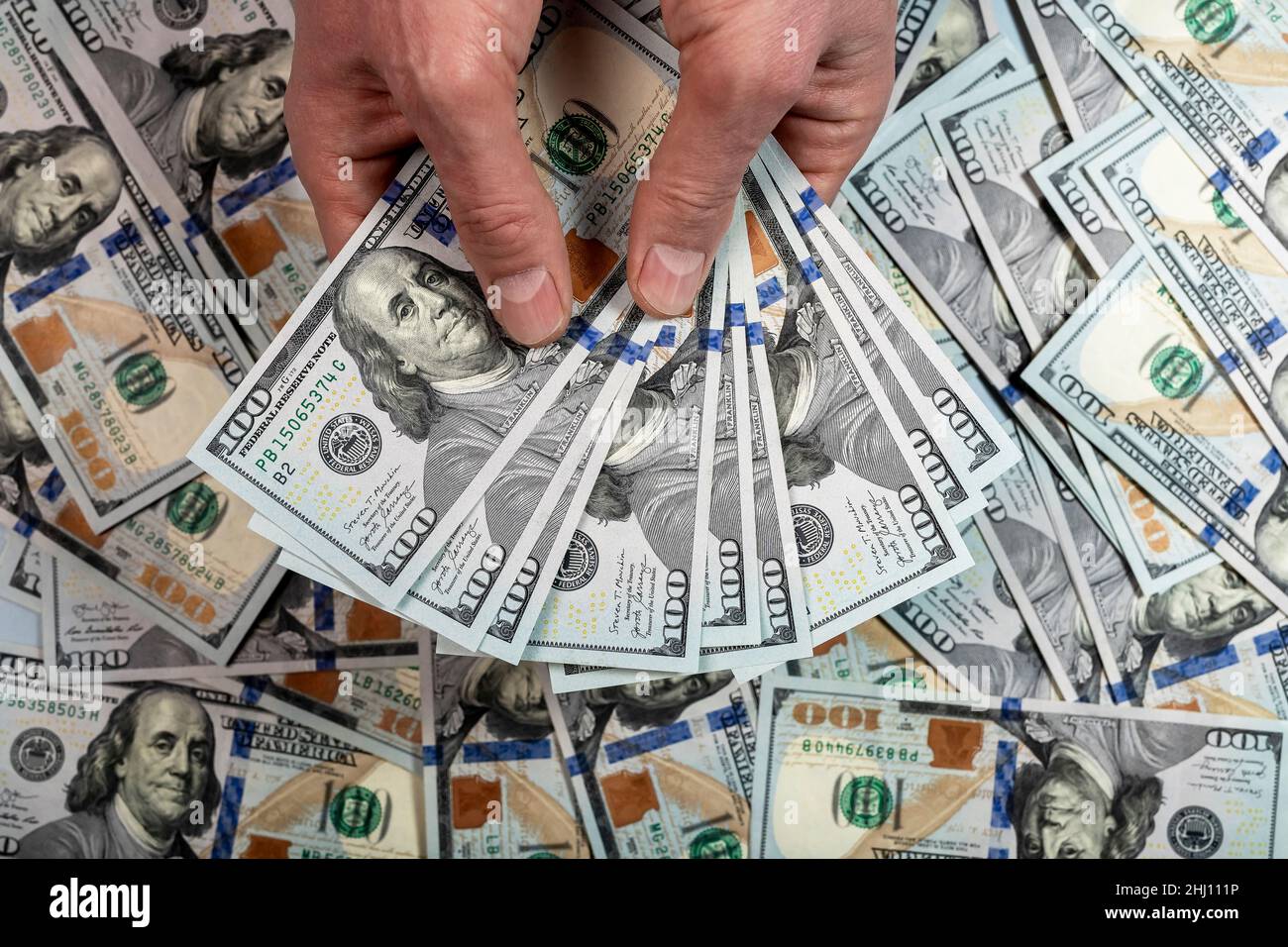 Hands counting paper money, US dollars. Holding paper money over cash ...