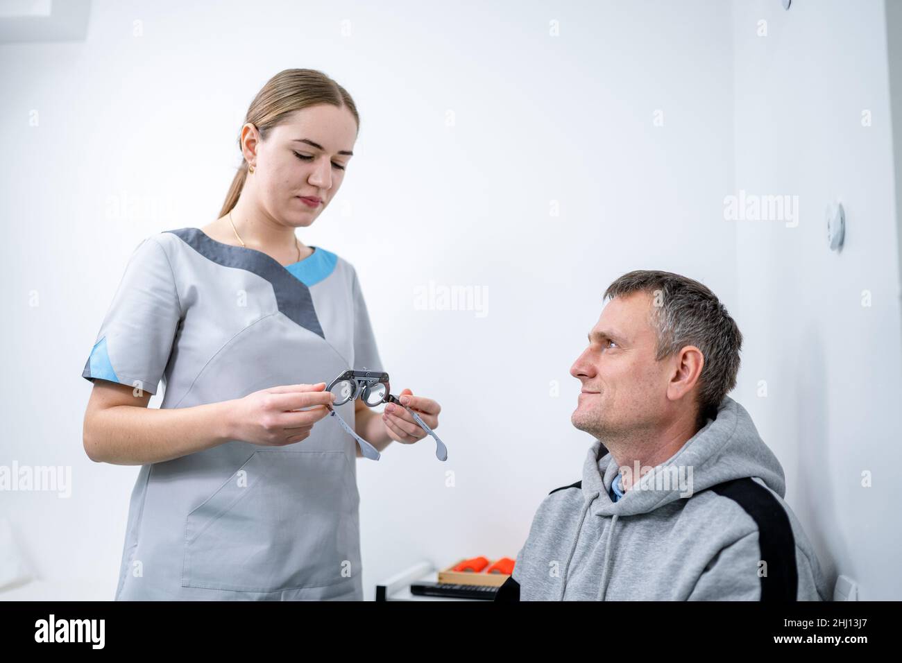 Vision correction. Selection of eyeglasses. Professional trial frames ...