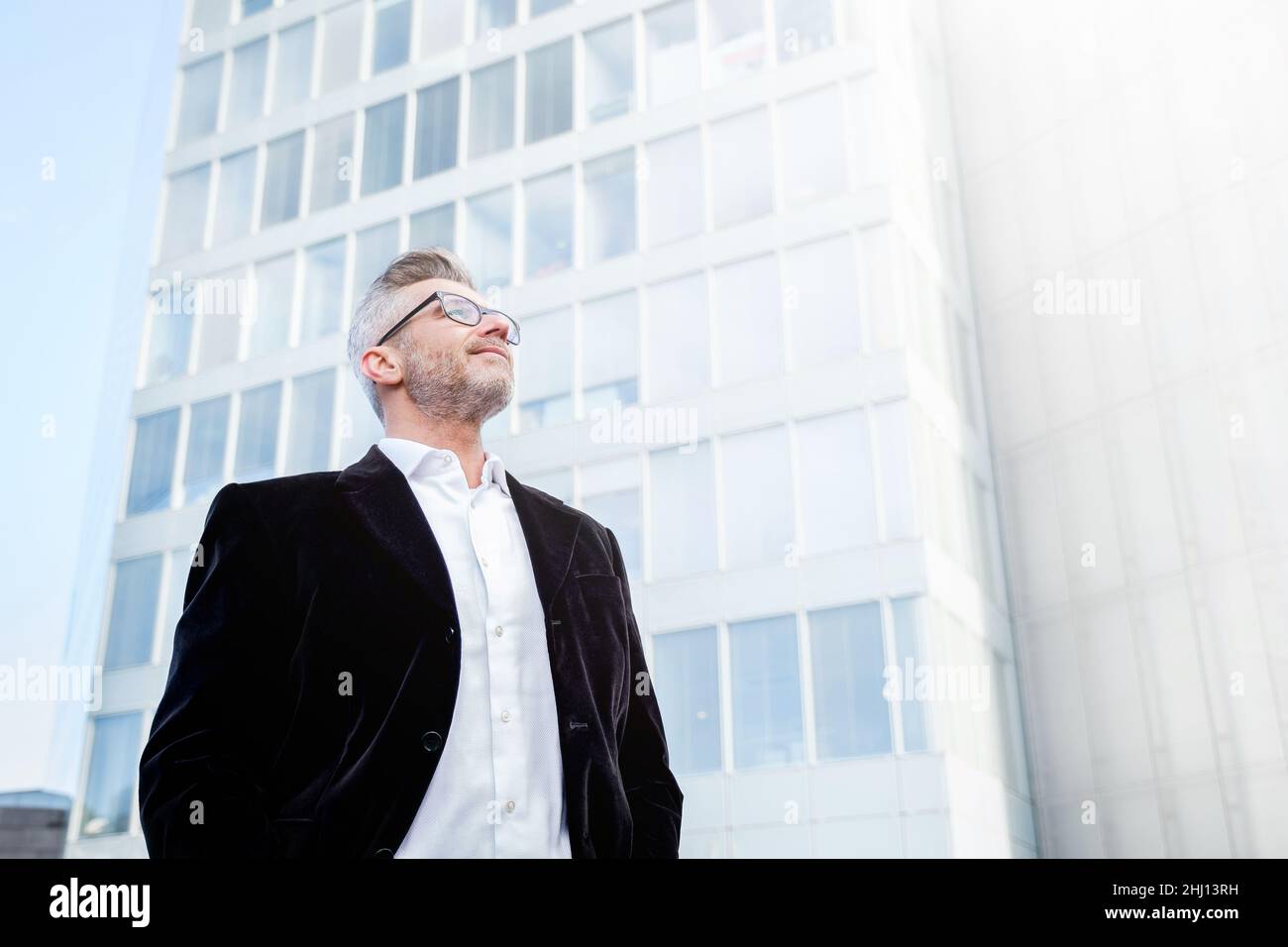 Portrait of a handsome, senior businessman with glasses - Positive boss ...