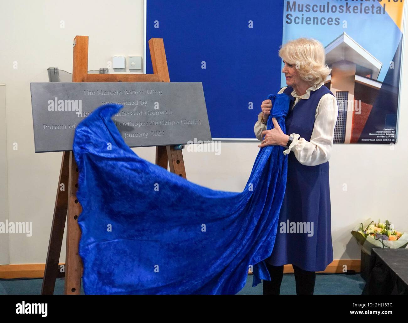The Duchess of Cornwall unveils a plaque during a visit to open the ...