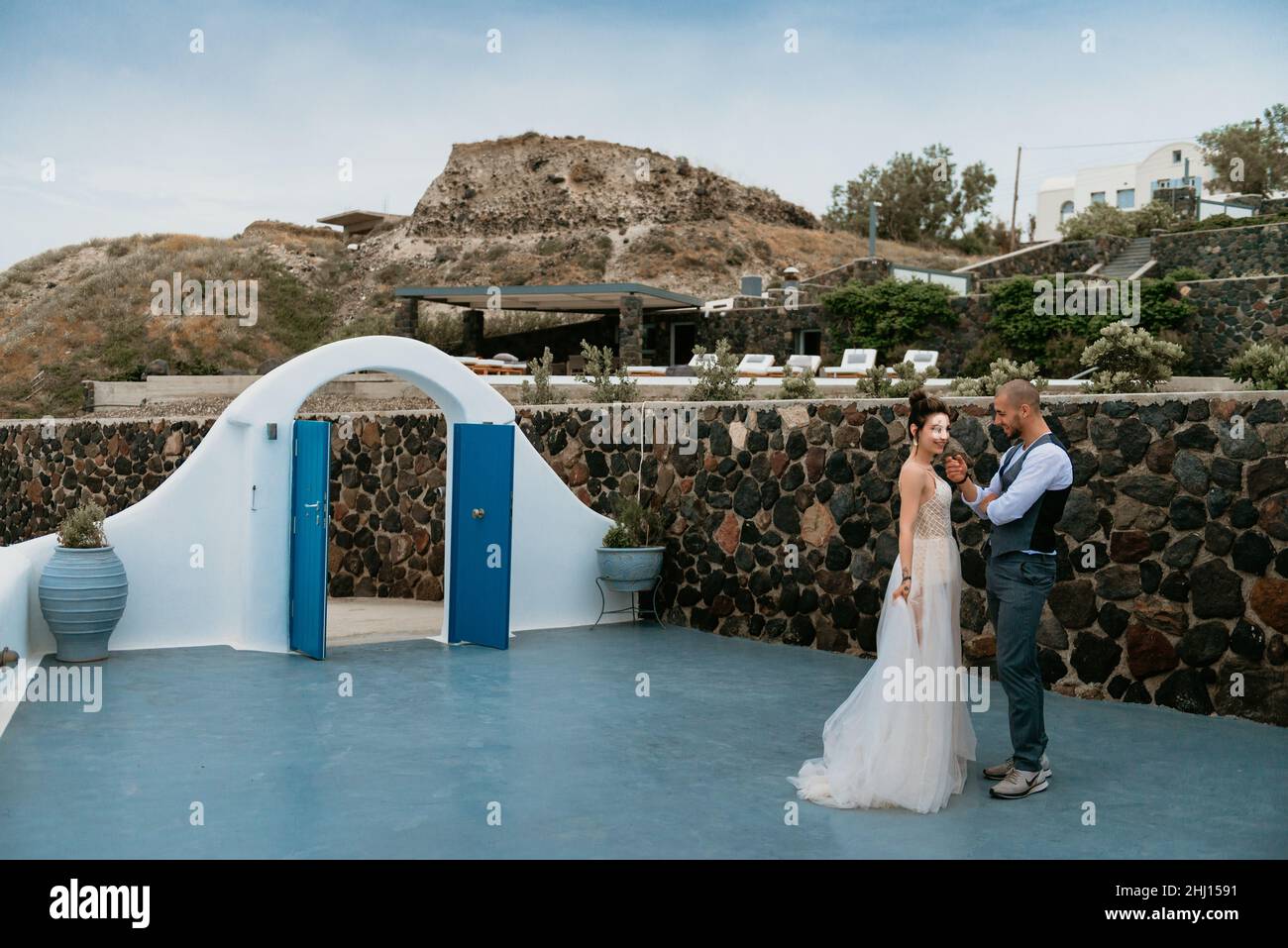 Beautiful Bride and Groom in their Summer Wedding Dy on Greek Island ...