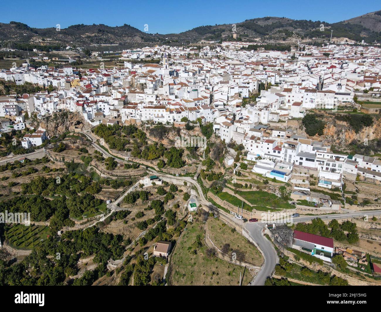 Drone view at the town of El Burgo on Andalucia in Spain Stock Photo ...