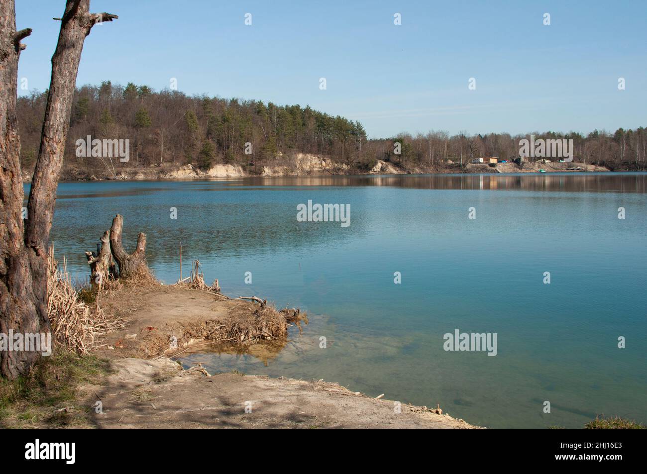 Bright landscape of lake with blue water Stock Photo - Alamy