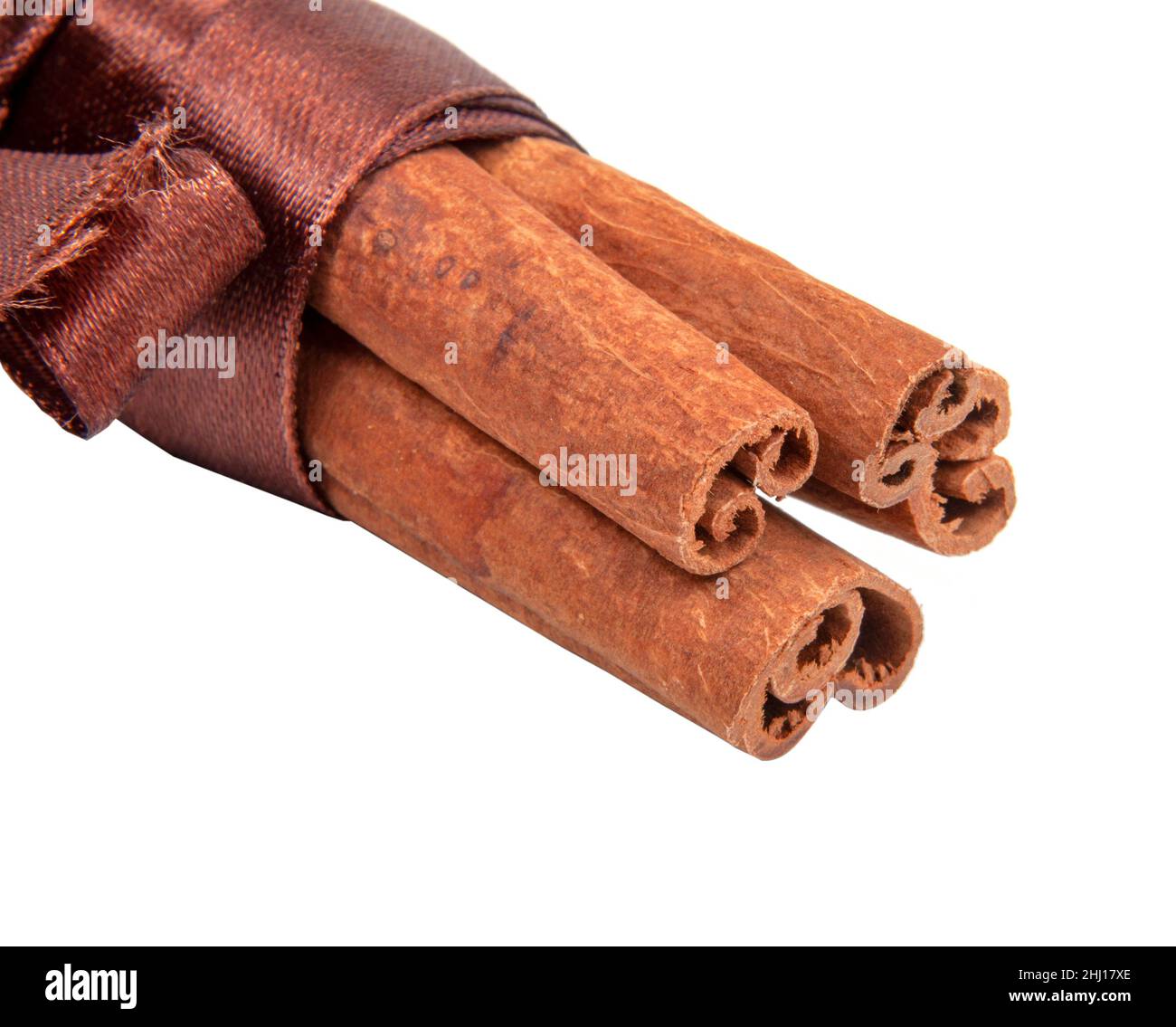 Dried sticks of cinnamon natural spices on white isolated Stock Photo ...