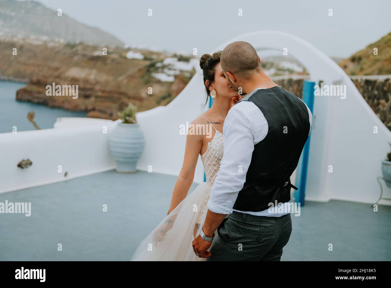 Beautiful Bride and Groom in their Summer Wedding Dy on Greek Island ...