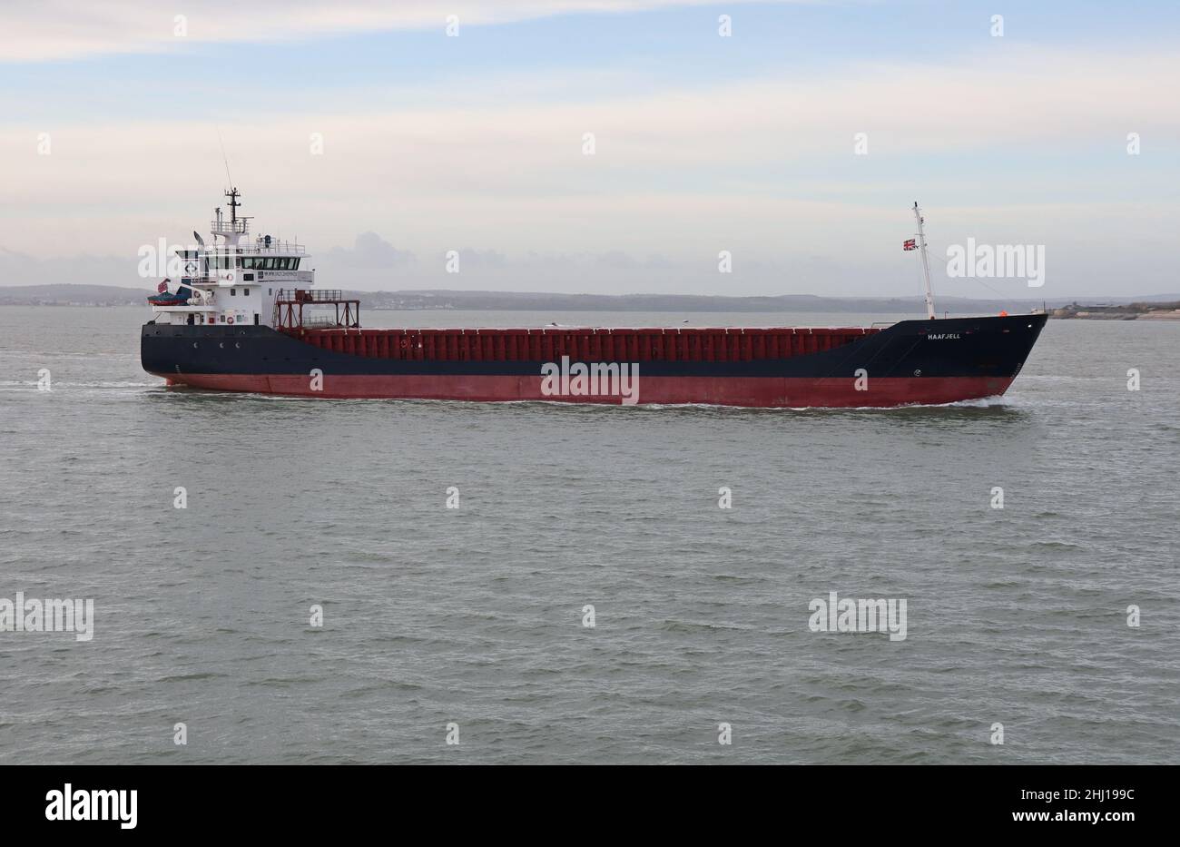 The cargo ship MV HAAFJELL approaching the harbour entrance. The ...